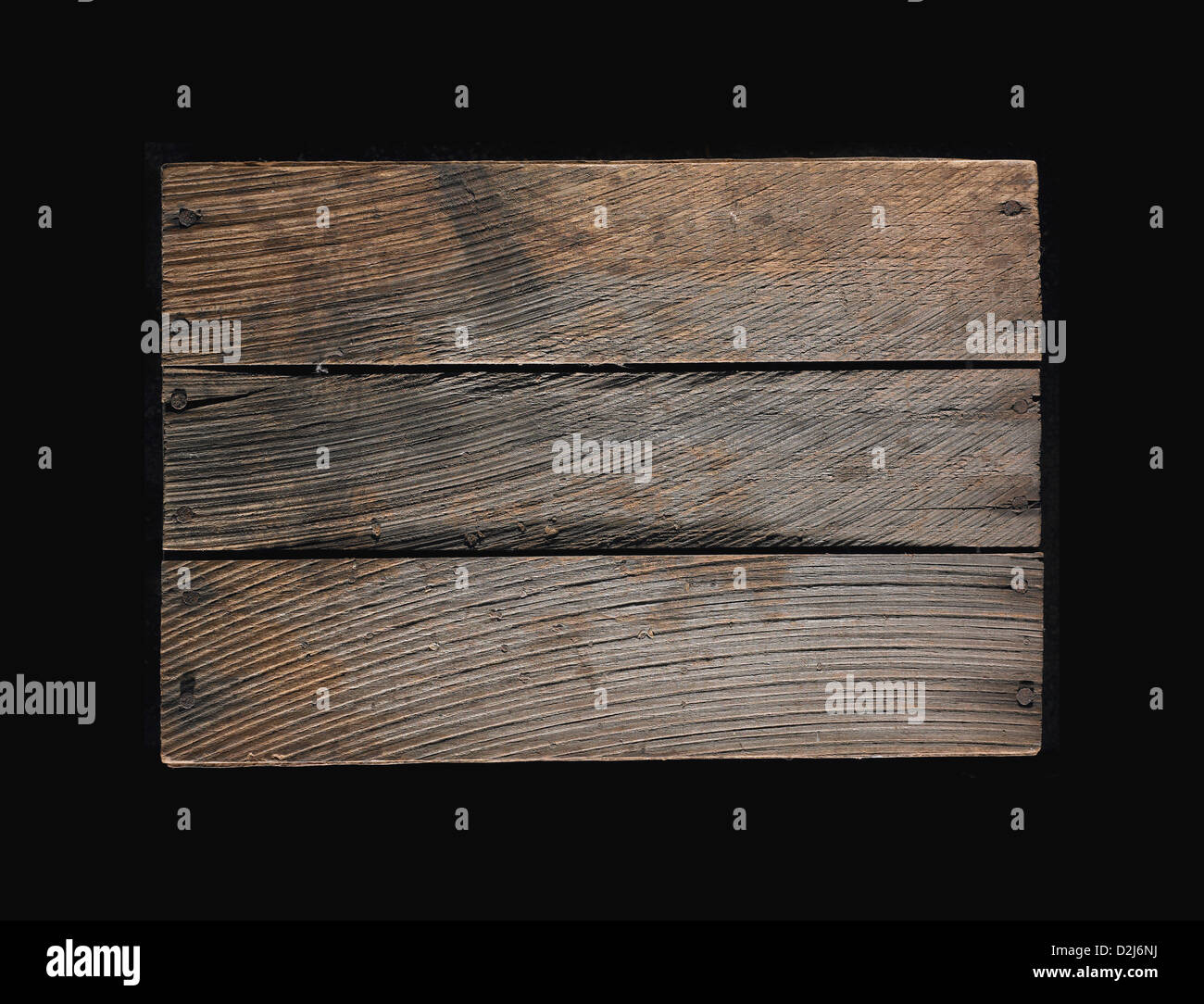 Three wooden boards nailed in a row on a black background Stock Photo ...