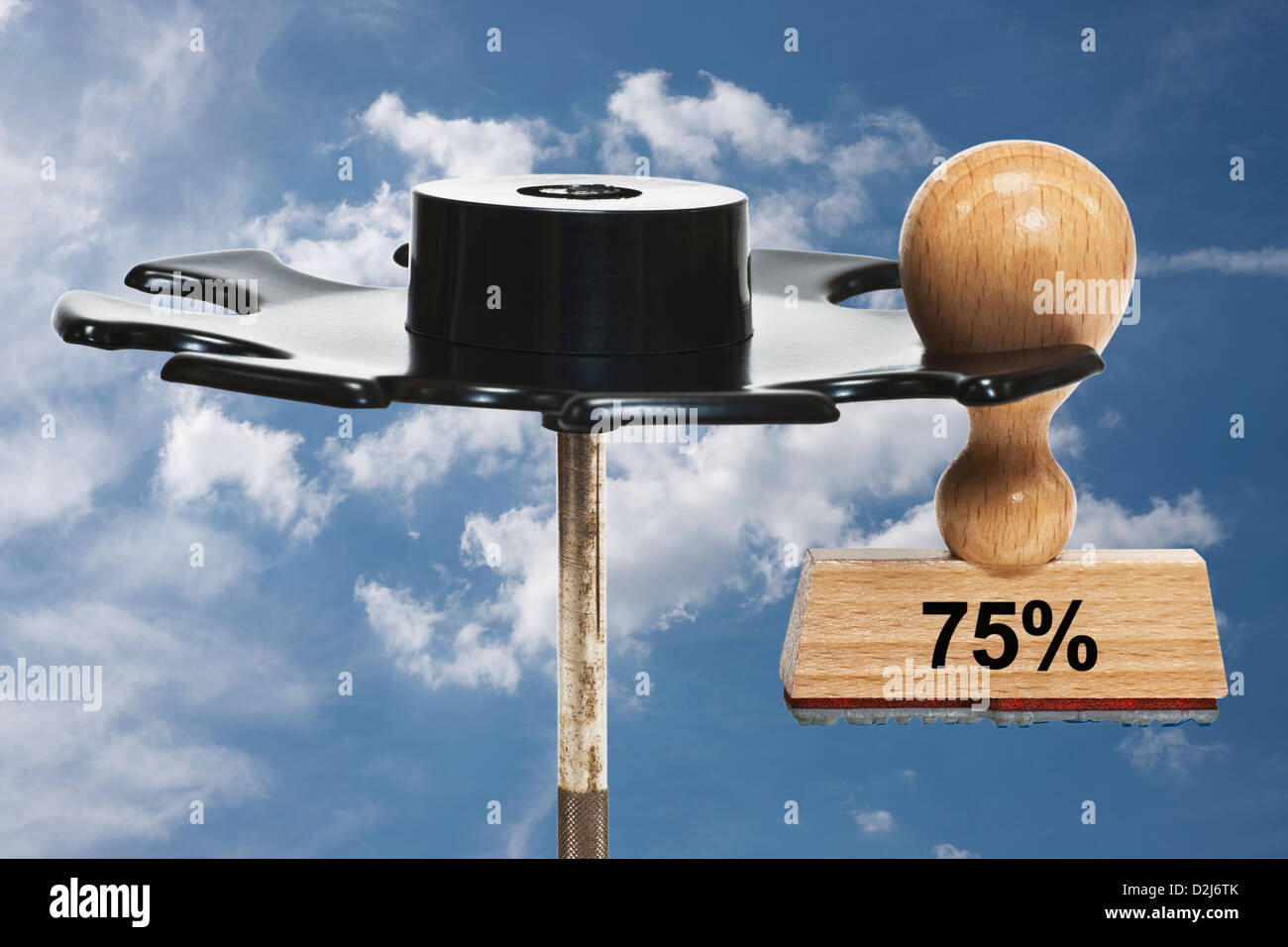 one stamp hanging in a stamp rack, he has the inscription 75 percentage ...