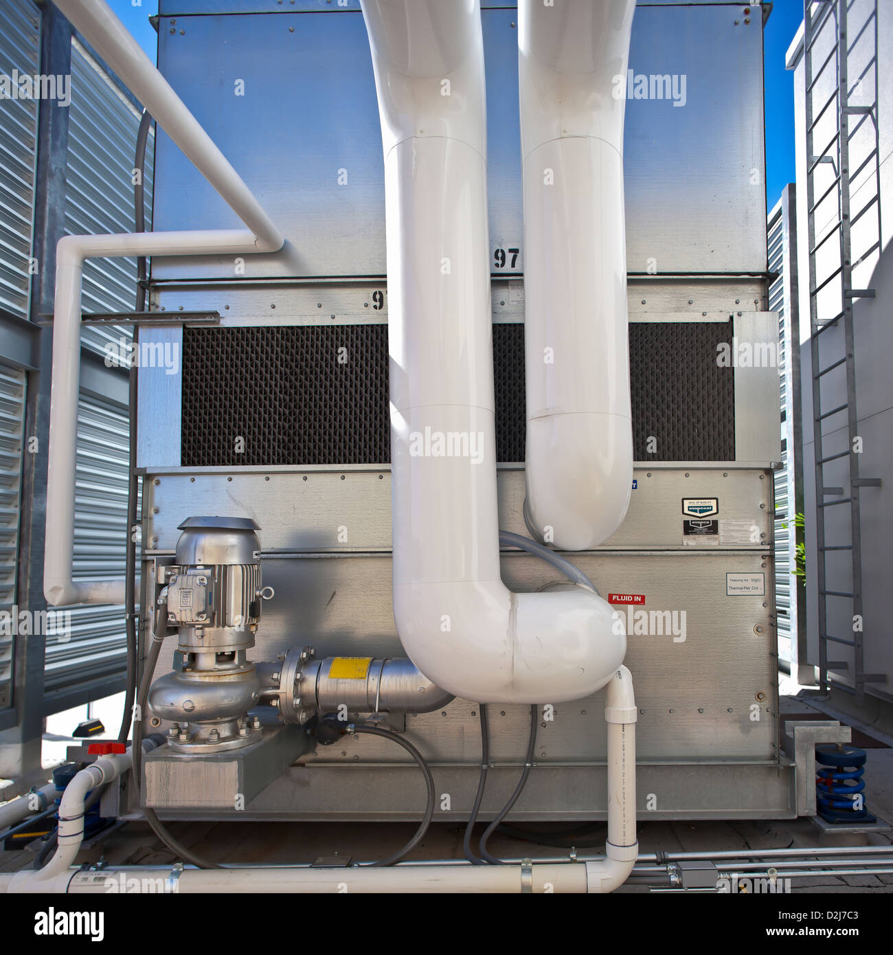 Water Tubes on a Building Roof Stock Photo - Alamy