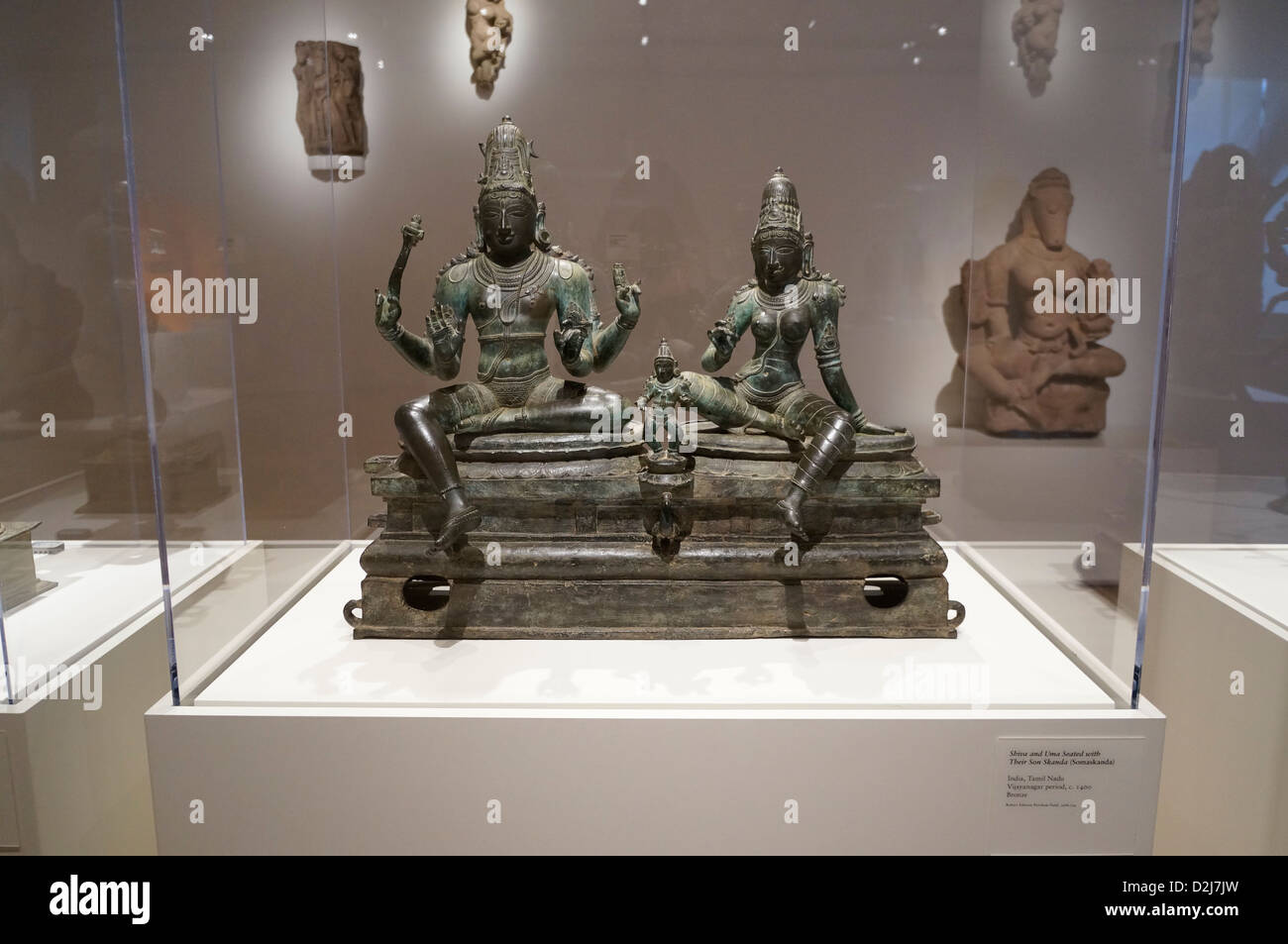 Uma (Parvati) and Shiva seated with their son Skanda (Somaskanda ...