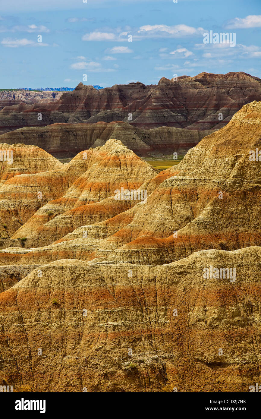 Light hitting the various areas of eroded formations in badlands ...
