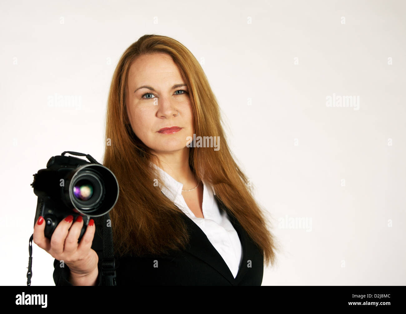Female photographer with modern digital SLR camera Stock Photo - Alamy
