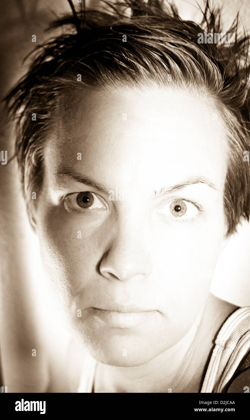 Black and white self portrait of a woman expressing fear and anxiety ...