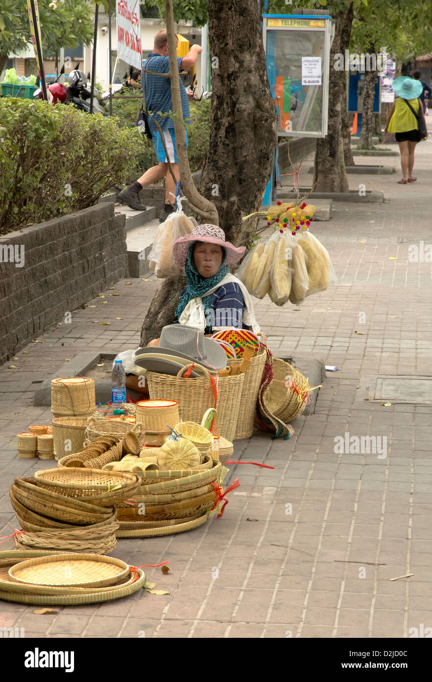 Street vendor in Thailand selling baskets Stock Photo - Alamy