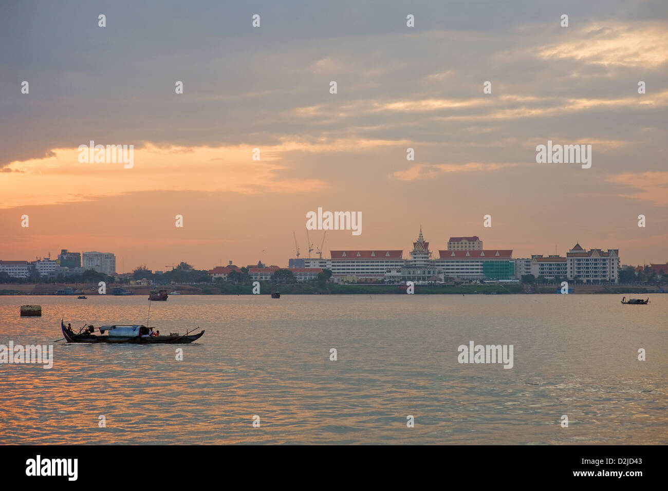 Phnom Penh, Cambodia, a fishing boat on the Mekong River in front of ...