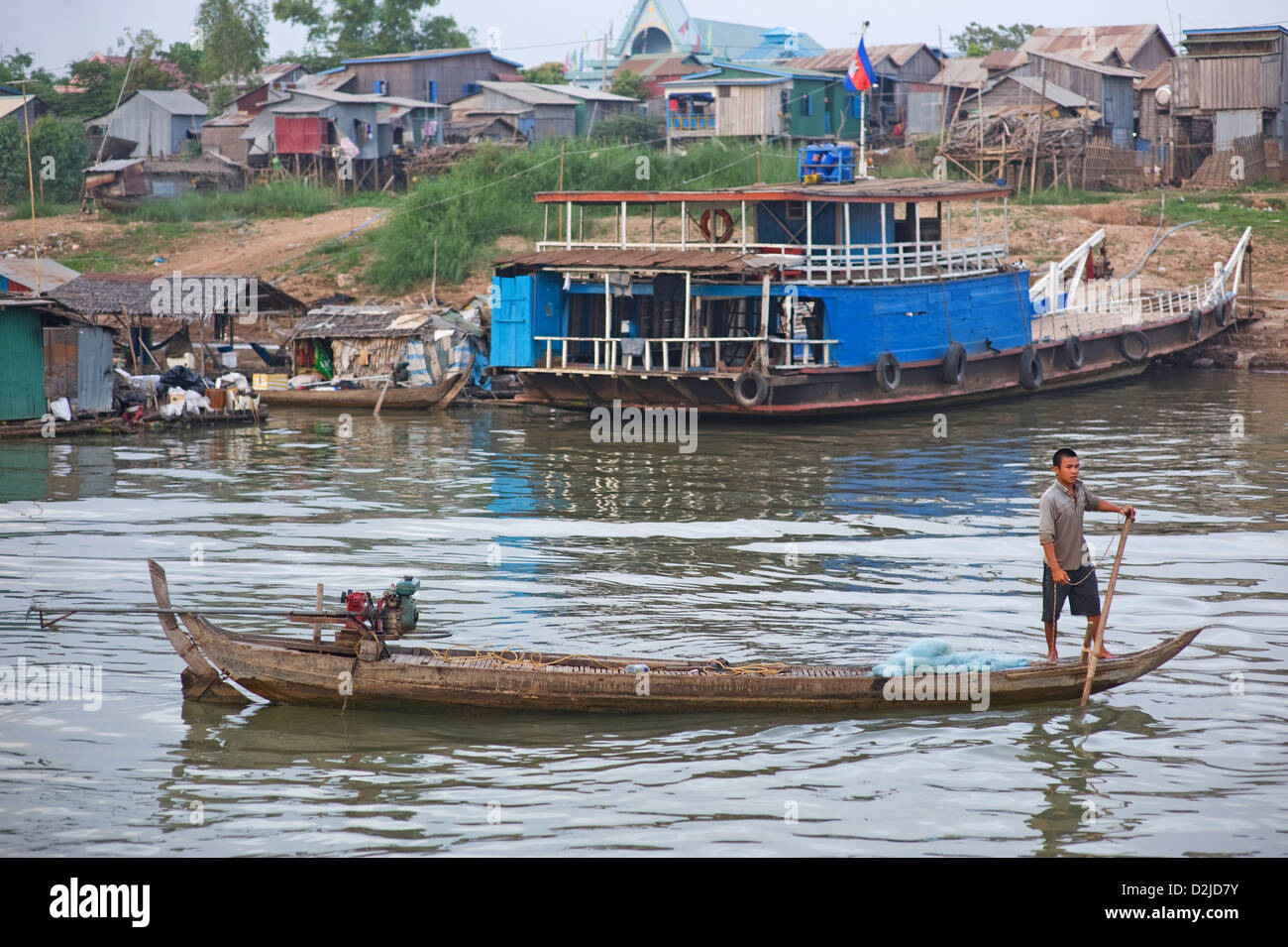 Phnom Penh, Cambodia, a fishing boat in front of a F √ § hre at the ...