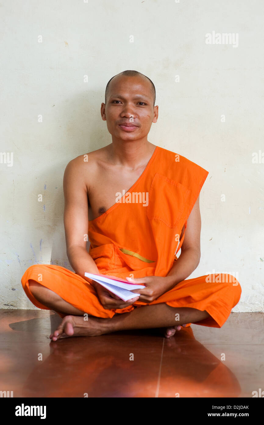 Phnom Penh, Cambodia, a Buddhist monk with a book Stock Photo - Alamy