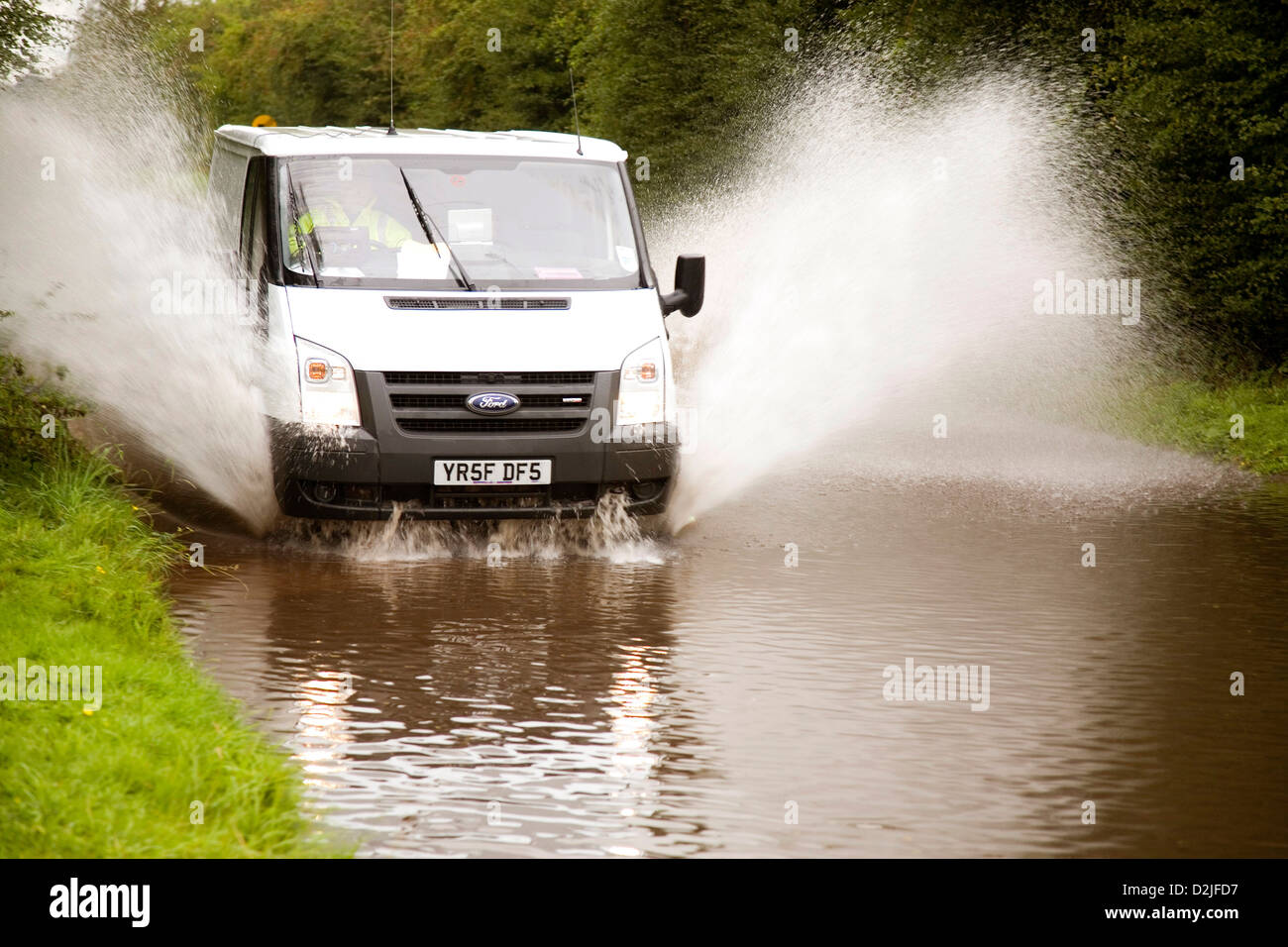 White van driving through water hi-res stock photography and images - Alamy