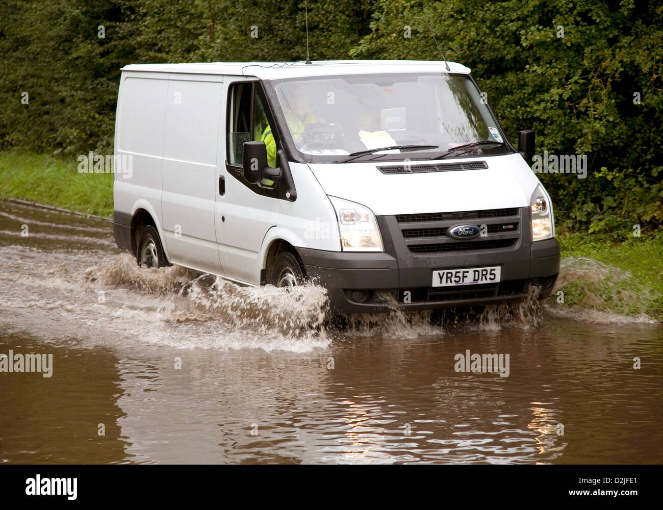 White ford transit van driving hi-res stock photography and images - Alamy