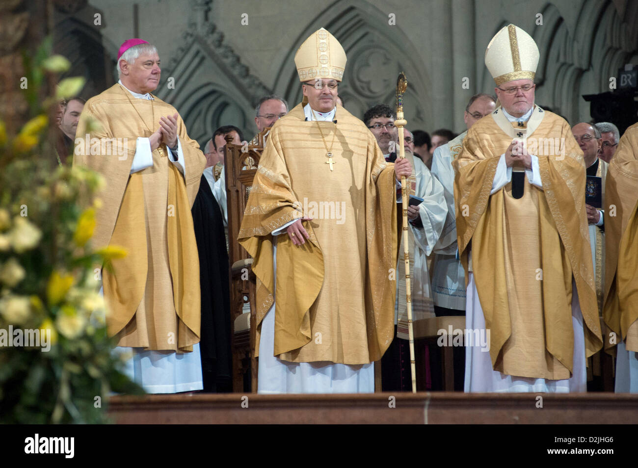 New bishop of Regensburg, Rudolf Voderholzer, stands next to his ...