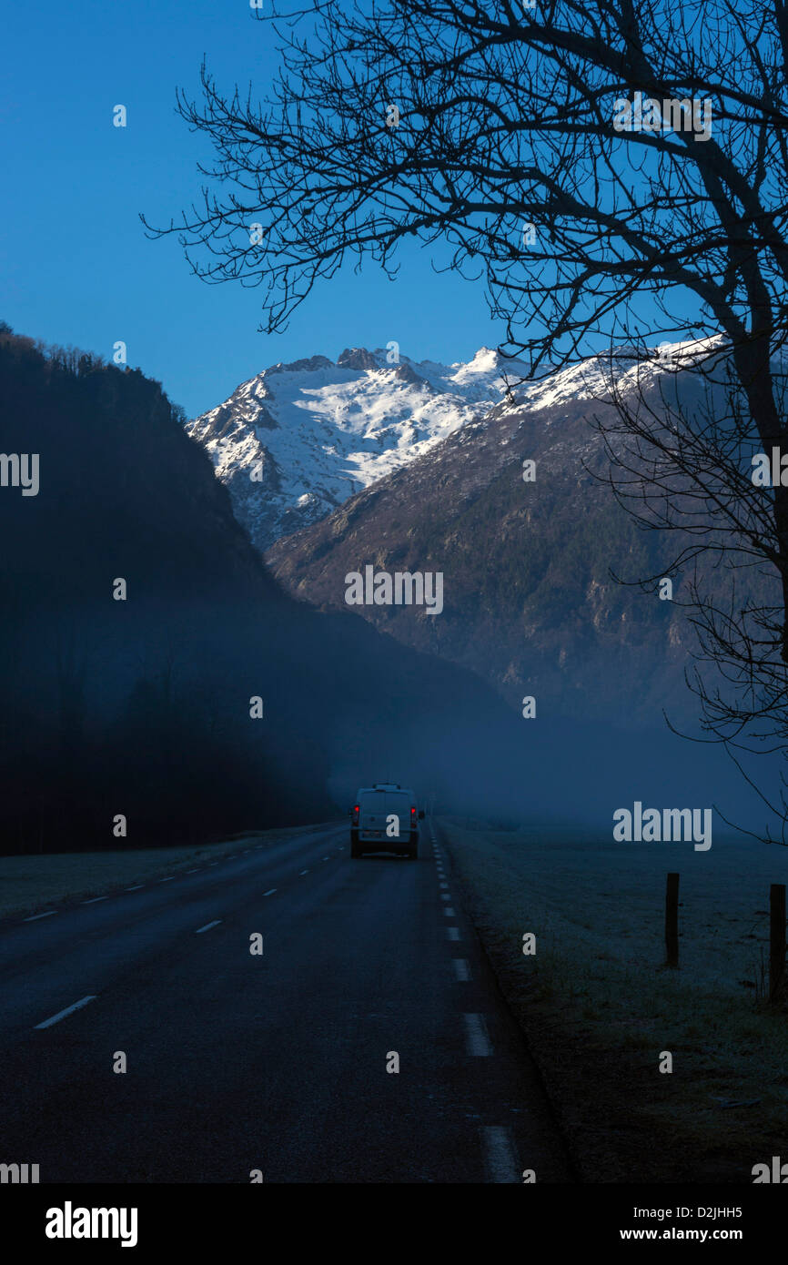 Low lying fog mist with snowy mountains beyond Stock Photo - Alamy