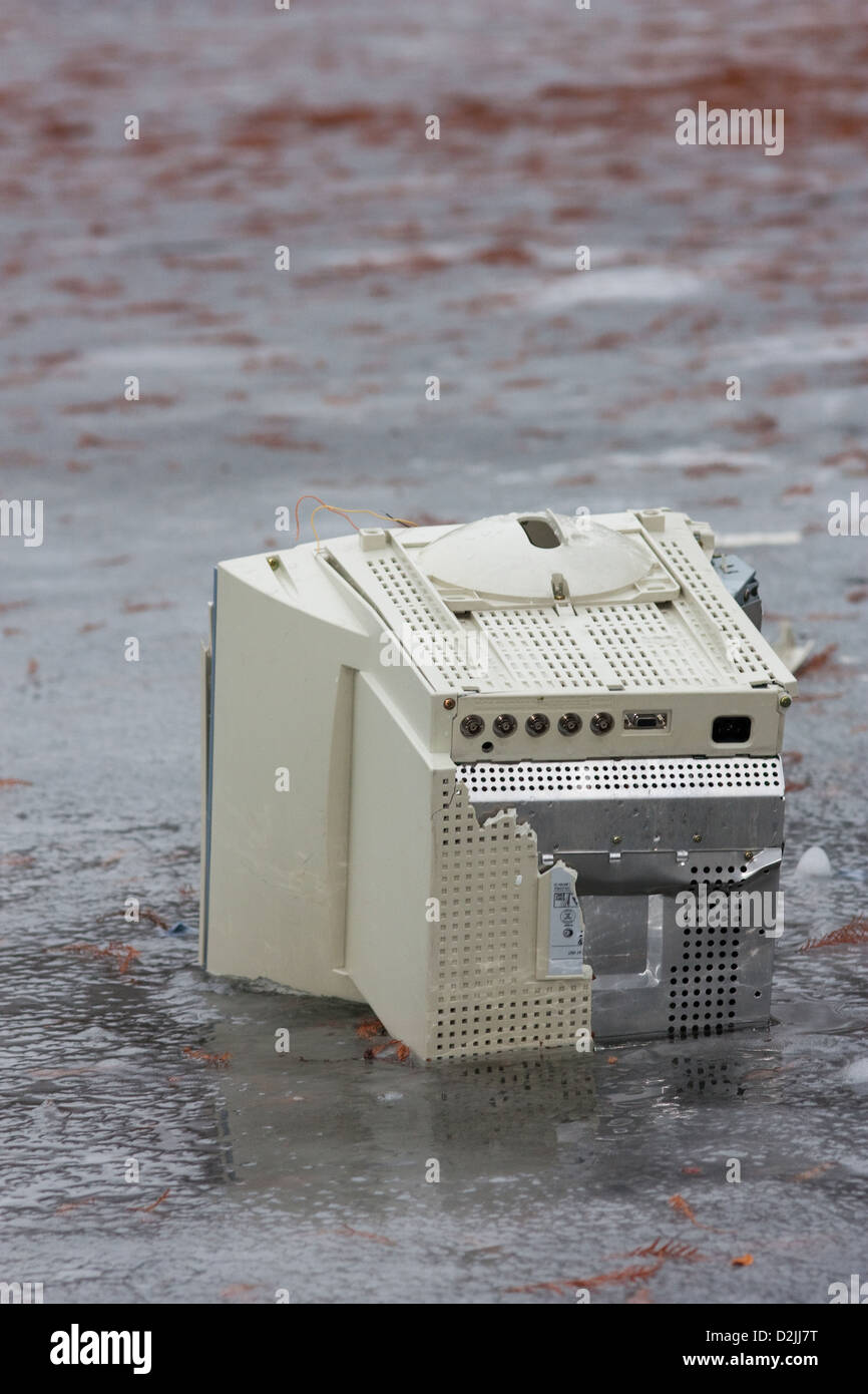 Berlin, Germany, discarded PC monitor on a frozen lake Stock Photo - Alamy