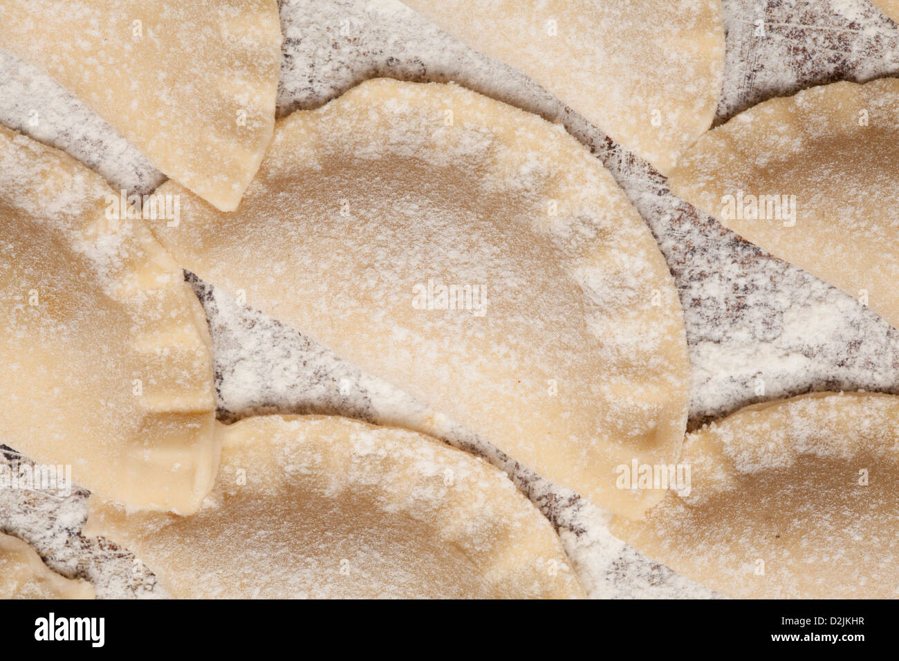 closeup of raw dumplings filled with cheese or food background Stock ...