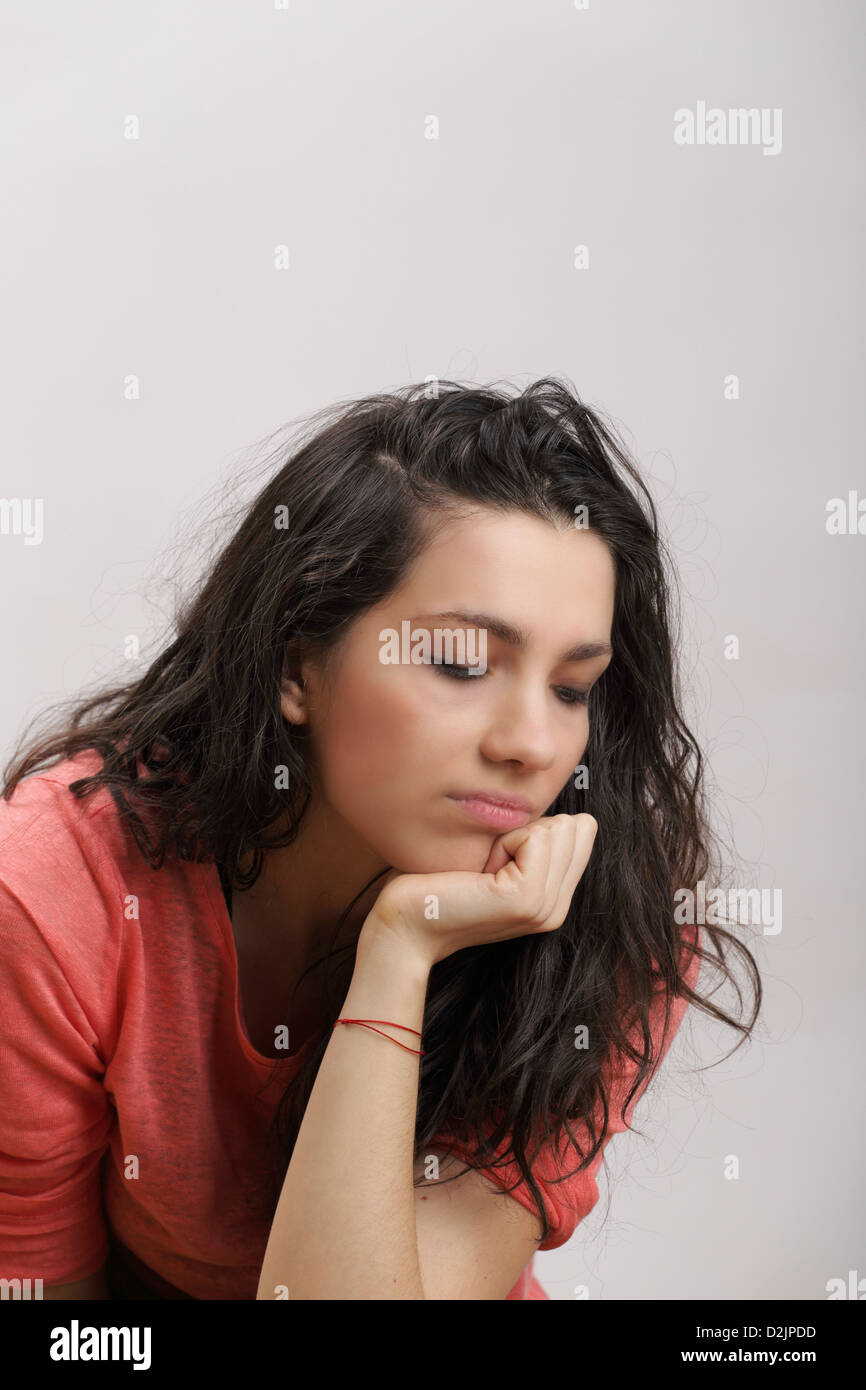Girl sad brown hair hi-res stock photography and images - Alamy