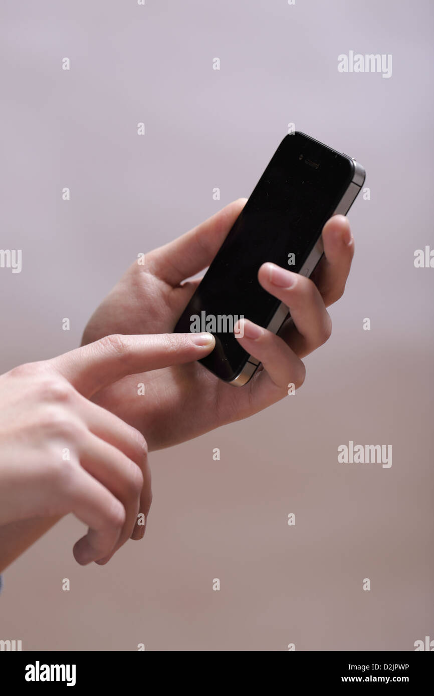 Hands with phone Stock Photo - Alamy