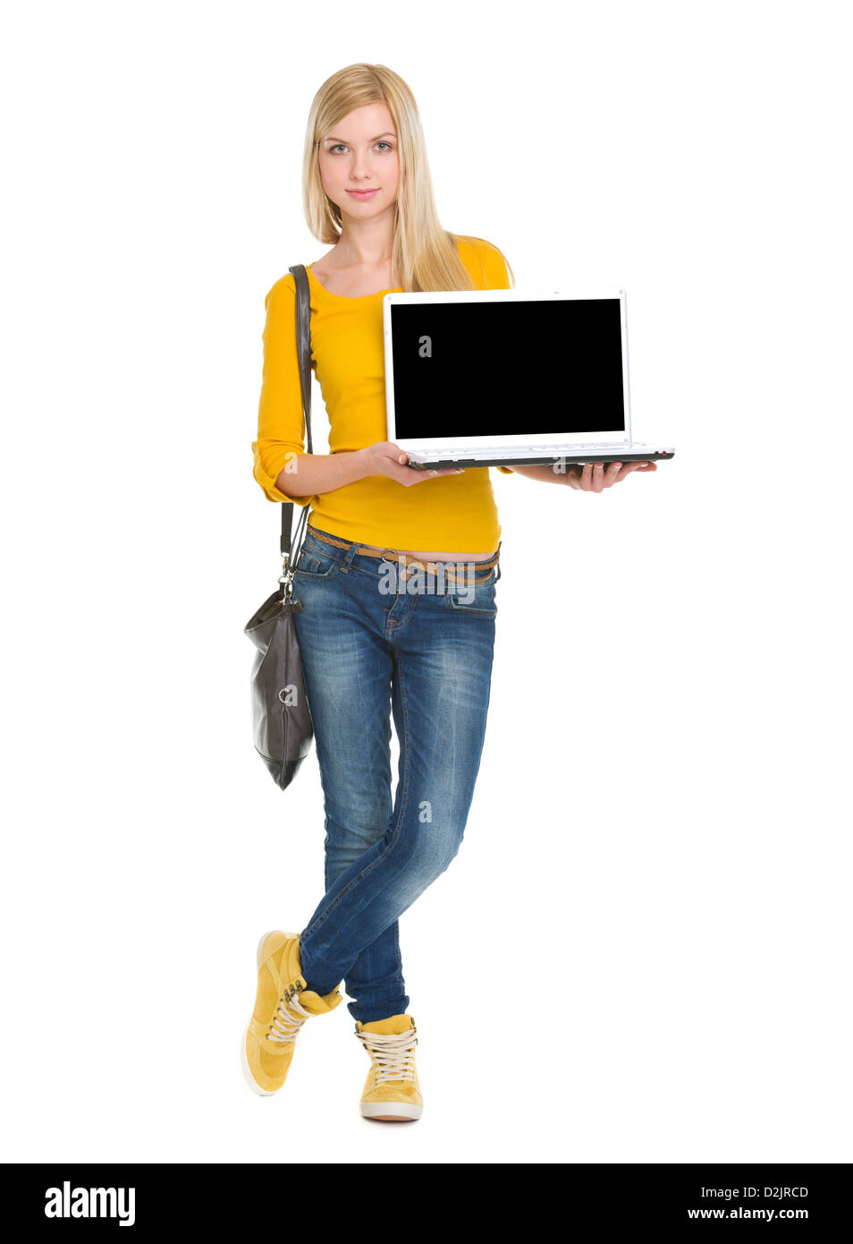 Full length portrait of happy student girl showing laptop Stock Photo ...