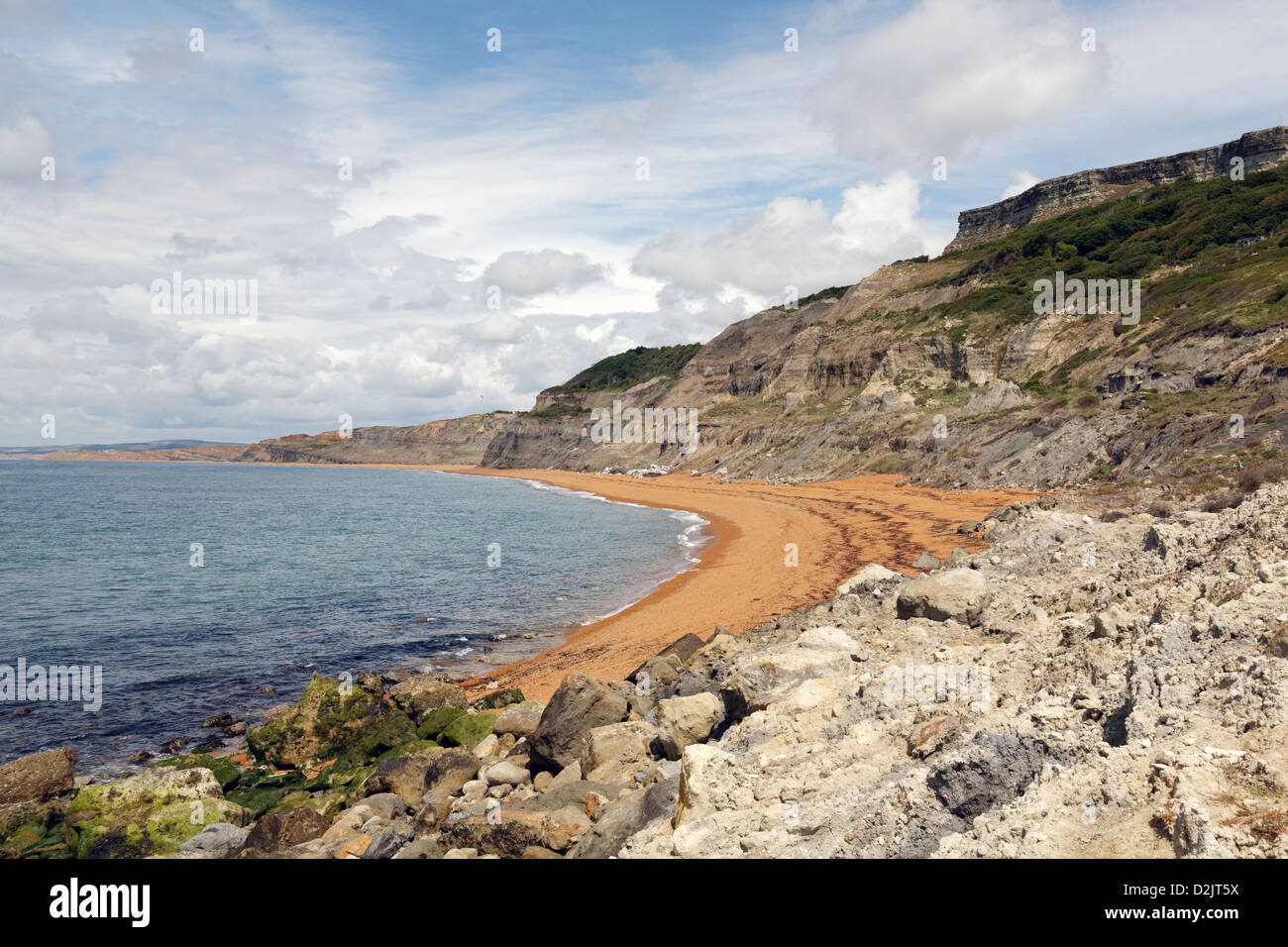 The rocky coastline of the Isle of Wight, showing the multi-coloured ...
