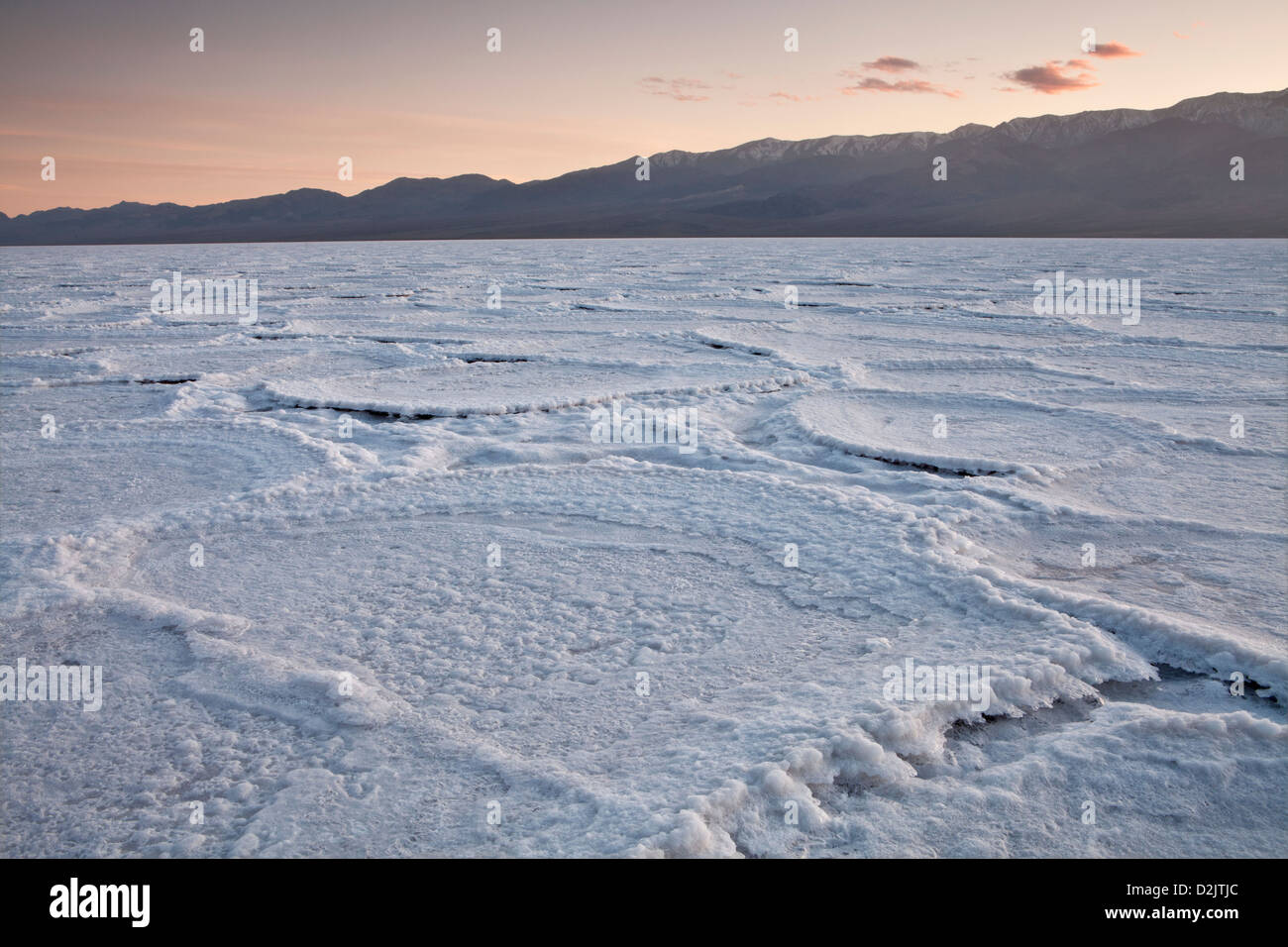 Salt pan polygons at Badwater during sunset, Death Valley National Park ...
