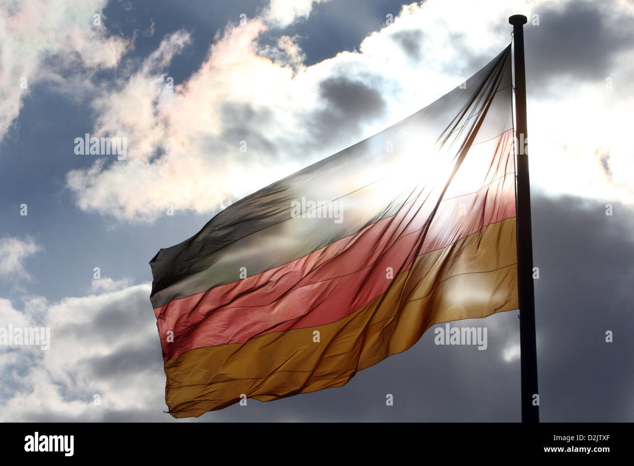 Berlin, Germany, a Germany flag waving in the back light Stock Photo ...