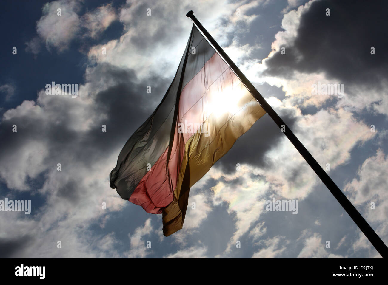 Berlin, Germany, a Germany flag waving in the back light Stock Photo ...