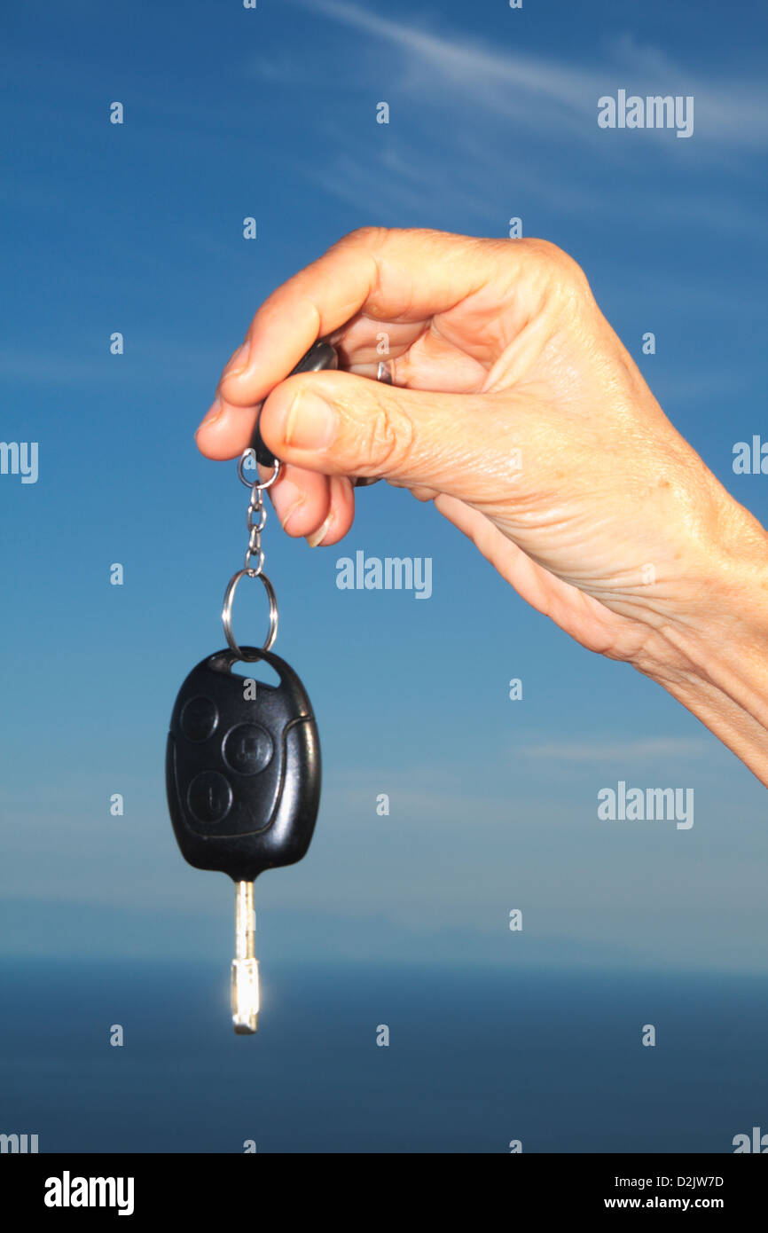 woman hand dangling a car key Stock Photo - Alamy