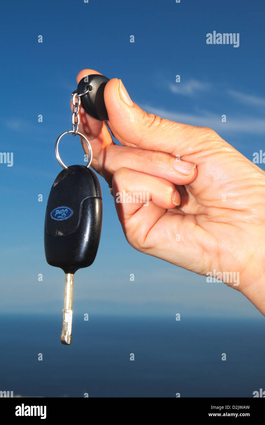 woman hand dangling a car key Stock Photo - Alamy