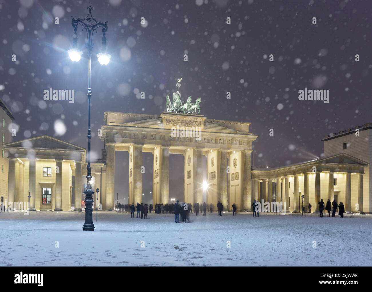 Berlin, Germany, the illuminated Brandenburg Gate in the evening light ...