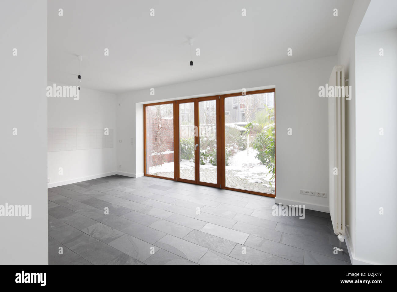 Berlin, Germany, rooms with wooden windows and stone floor in the new ...