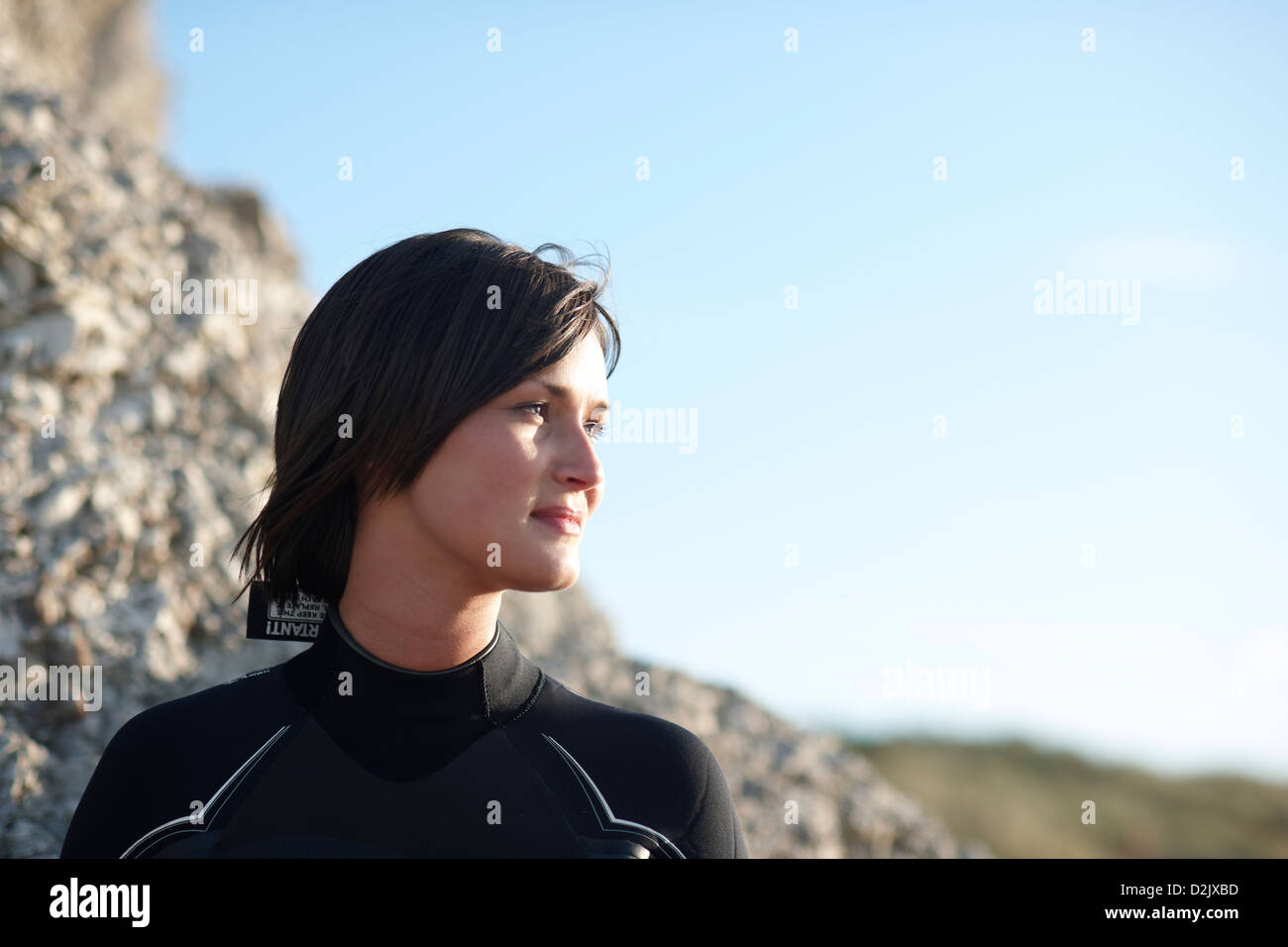 head shot of Female surfer in wetsuit Stock Photo - Alamy