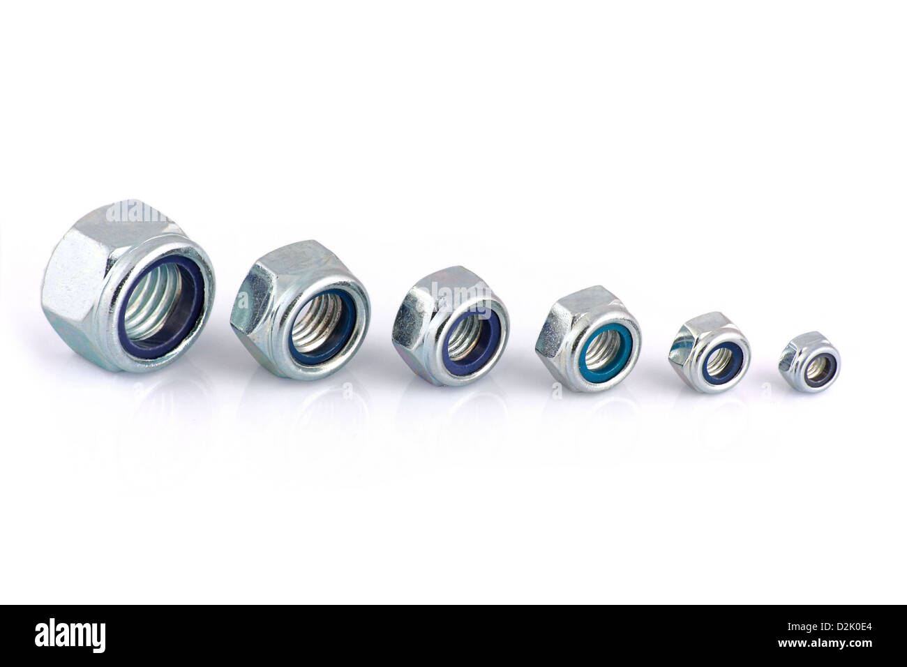 Different size fiber nuts isolated on white background Stock Photo - Alamy