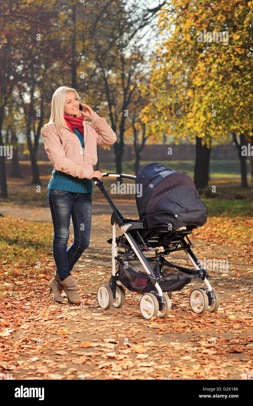 Pushing stroller mobile phone hi-res stock photography and images - Alamy