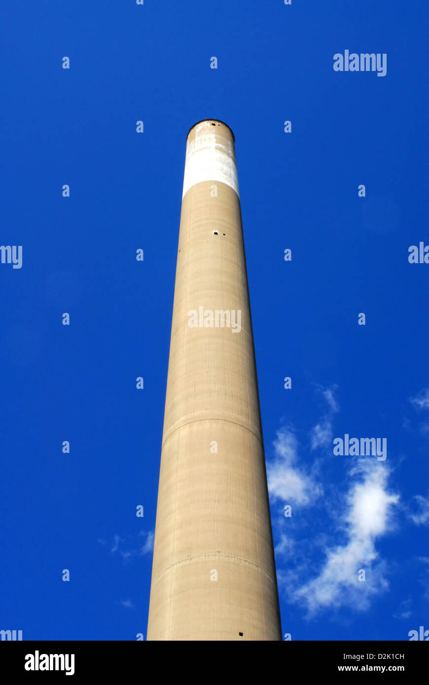 Single smokestack rising into blue sky with cloud Stock Photo - Alamy