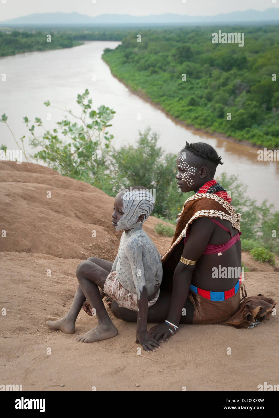 Portrait of Kara woman and child sitting-Omo River below Stock Photo ...