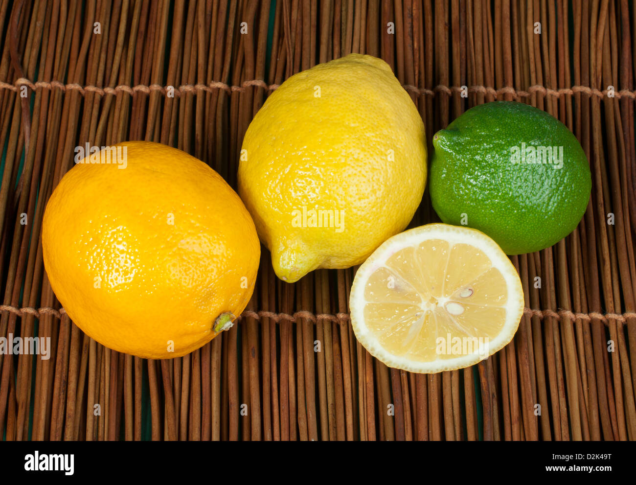 Three varieties of lemons. Yellow lemon, lime and orange lemon Stock ...