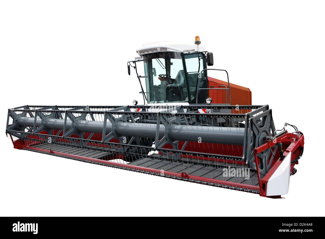 Red modern combine separately on a white background Stock Photo - Alamy