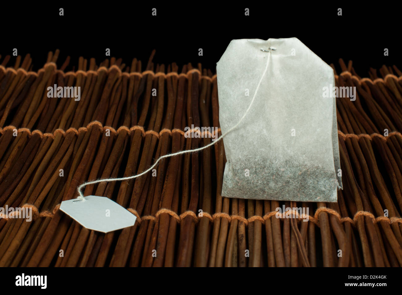 Tea bag close up on wooden base Stock Photo - Alamy