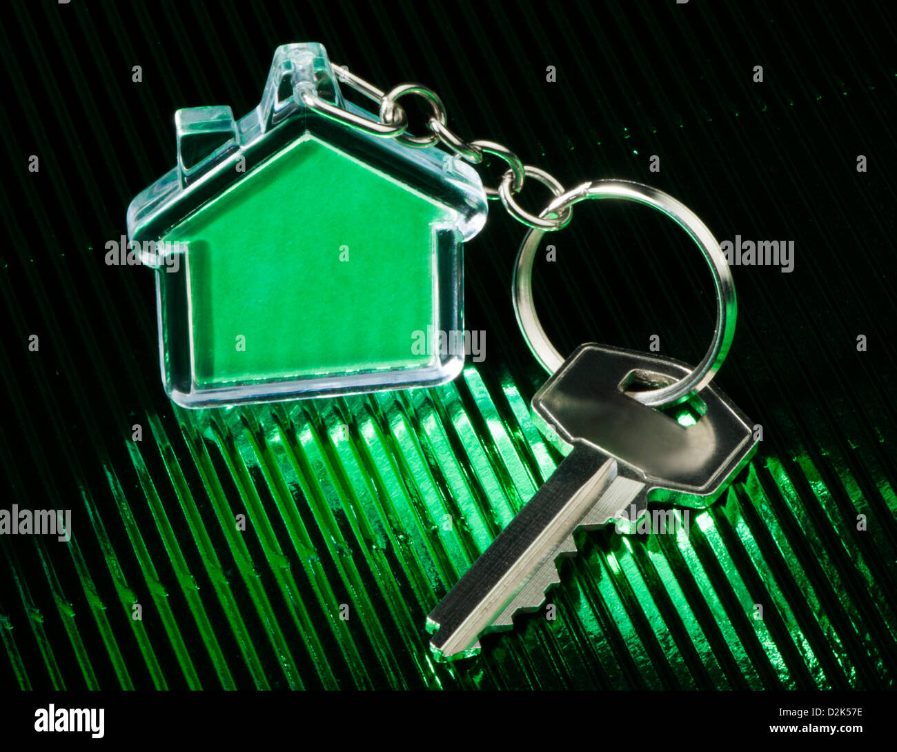 Keychain figure of house and key close up Stock Photo - Alamy