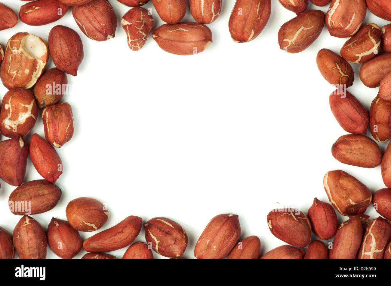 Raw shelled peanuts.Isolated border on white Stock Photo - Alamy