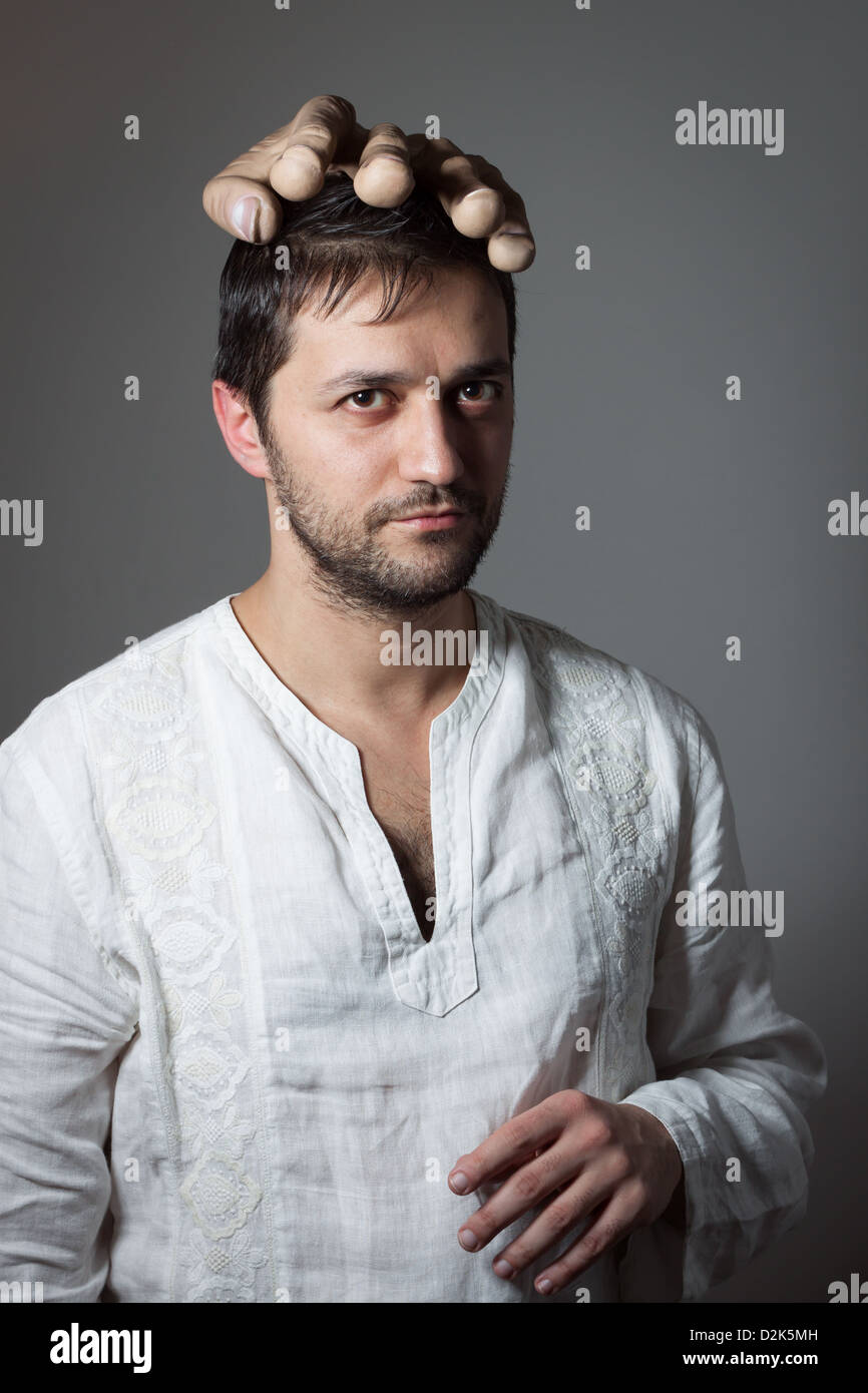 Man with huge head hi-res stock photography and images - Alamy