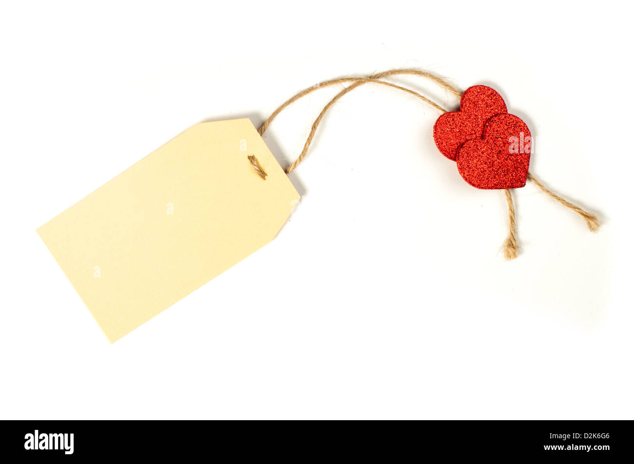 Paper label with rope and red hearts. White isolated Stock Photo - Alamy