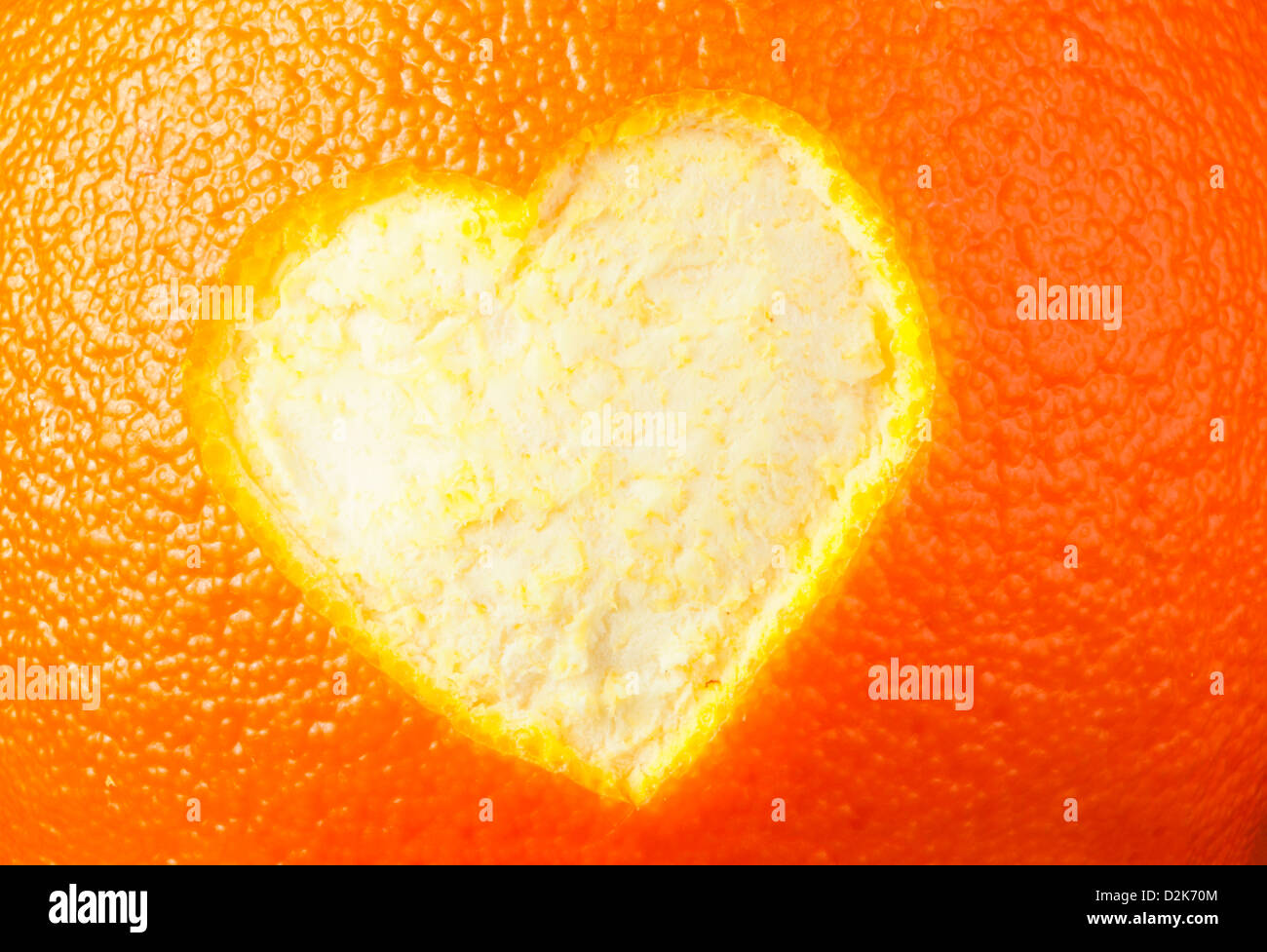Heart shape closeup carved in orange peel Stock Photo - Alamy