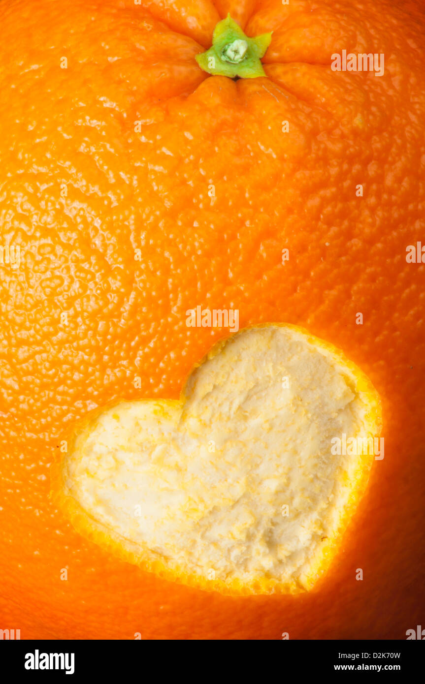 Heart shape closeup carved in orange peel Stock Photo - Alamy