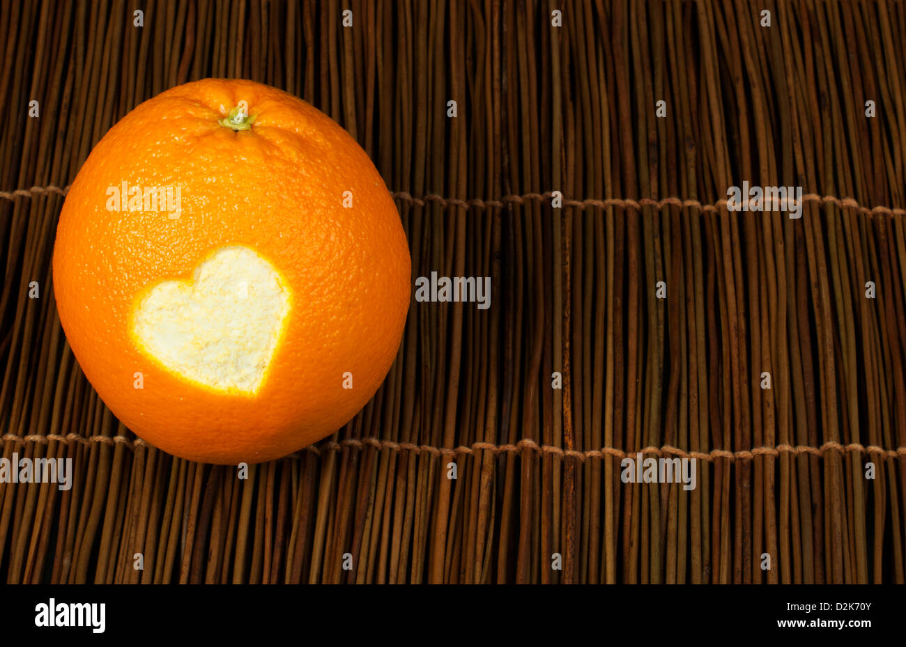Heart shape closeup carved in orange peel Stock Photo - Alamy