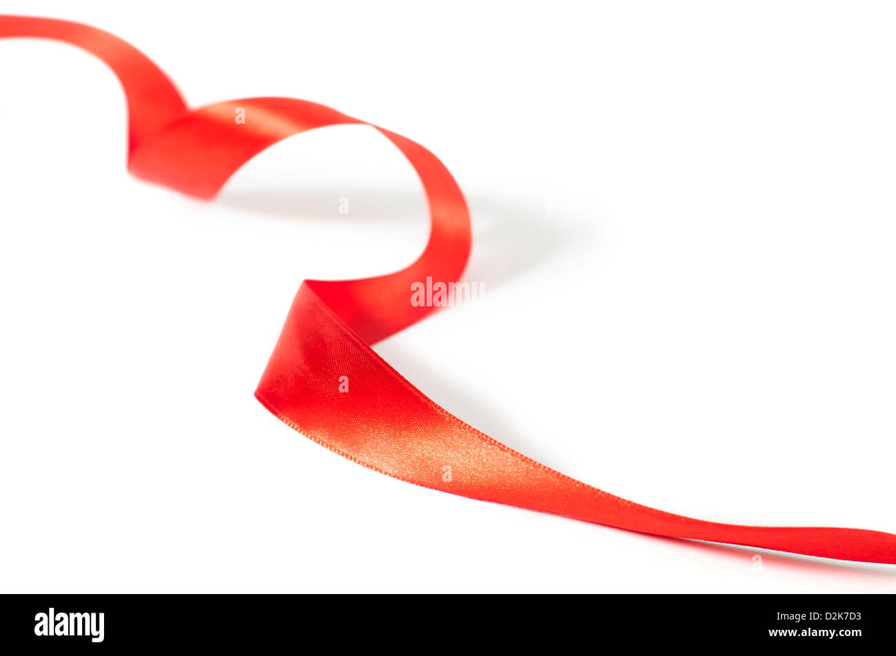 Red ribbon for gift wrap on white background Stock Photo - Alamy