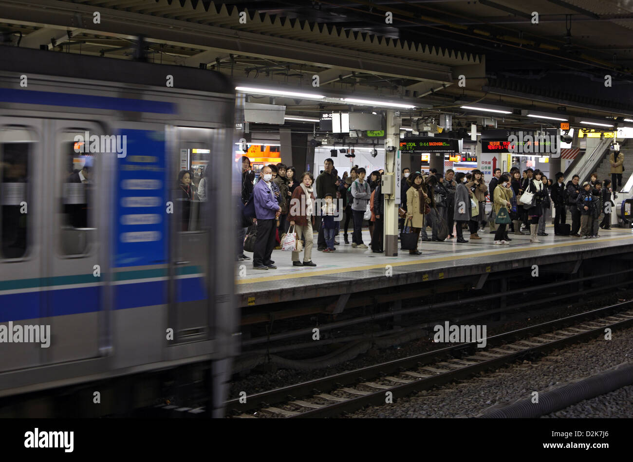 Tokyo, Japan, people on a subway platform of Shinjuku Station Stock ...