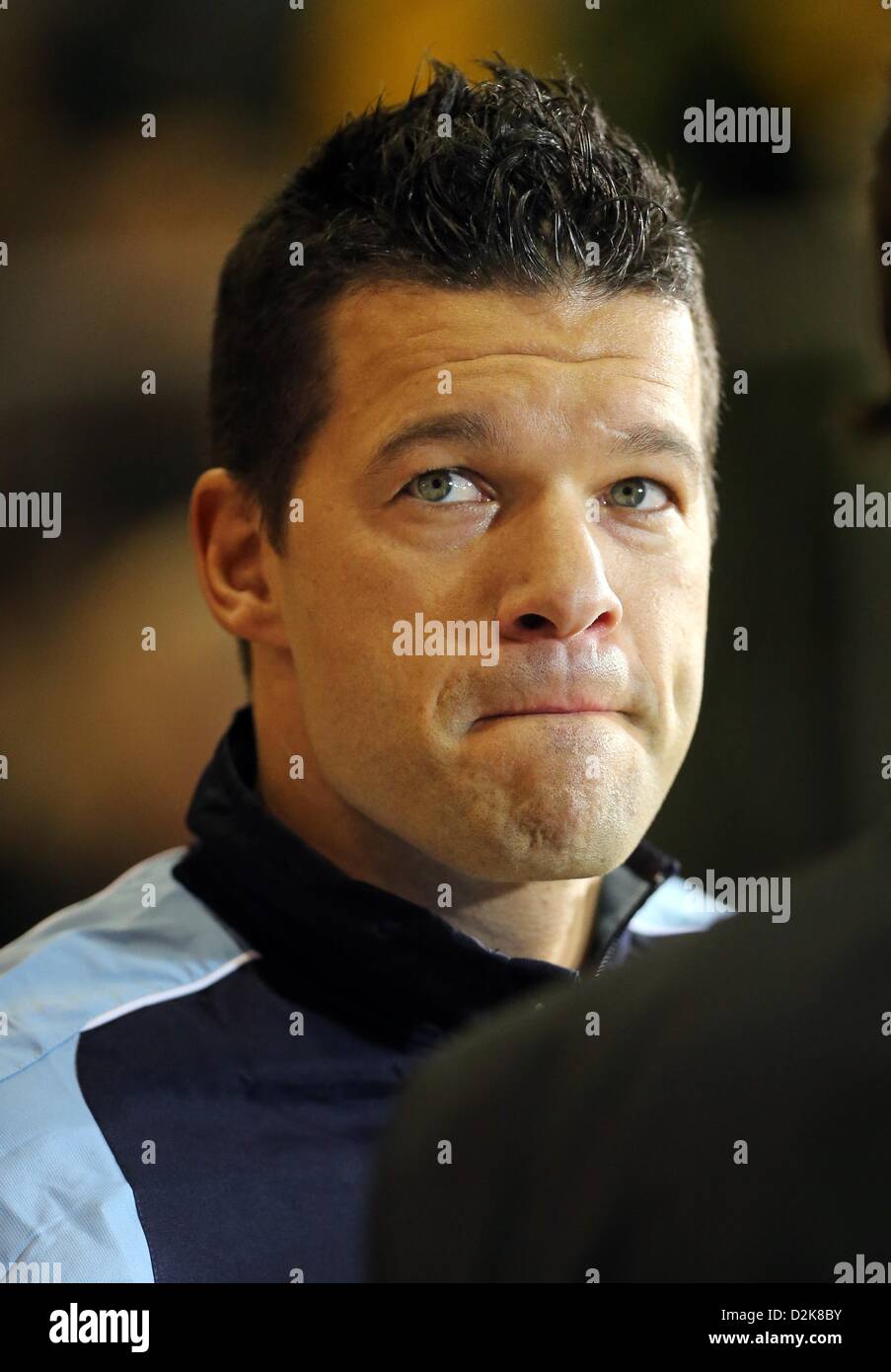 Former German national team player, Michael Ballack (C), gives an ...