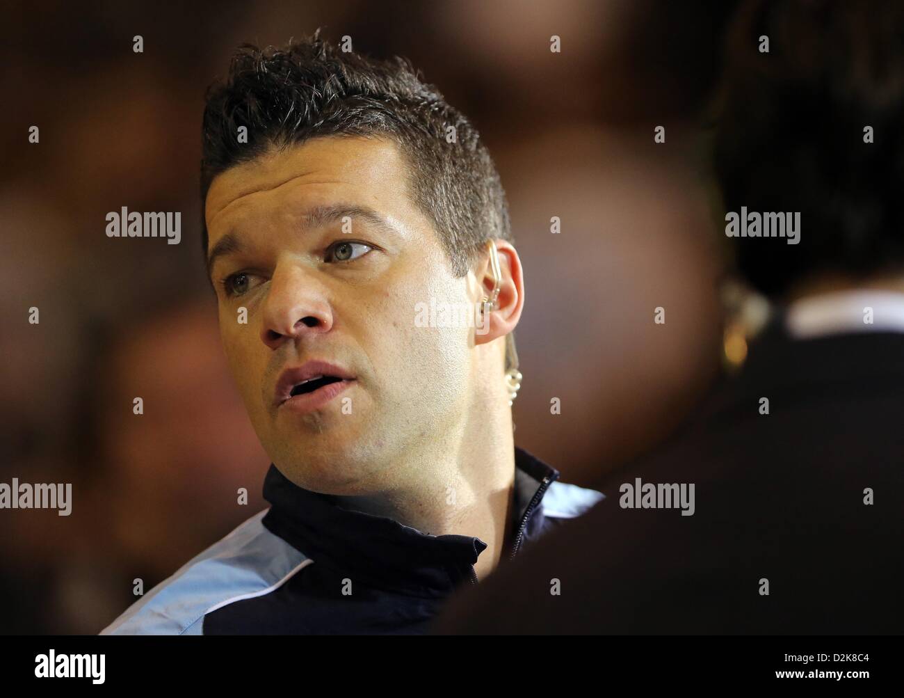 Former German national team player, Michael Ballack (C), gives an ...