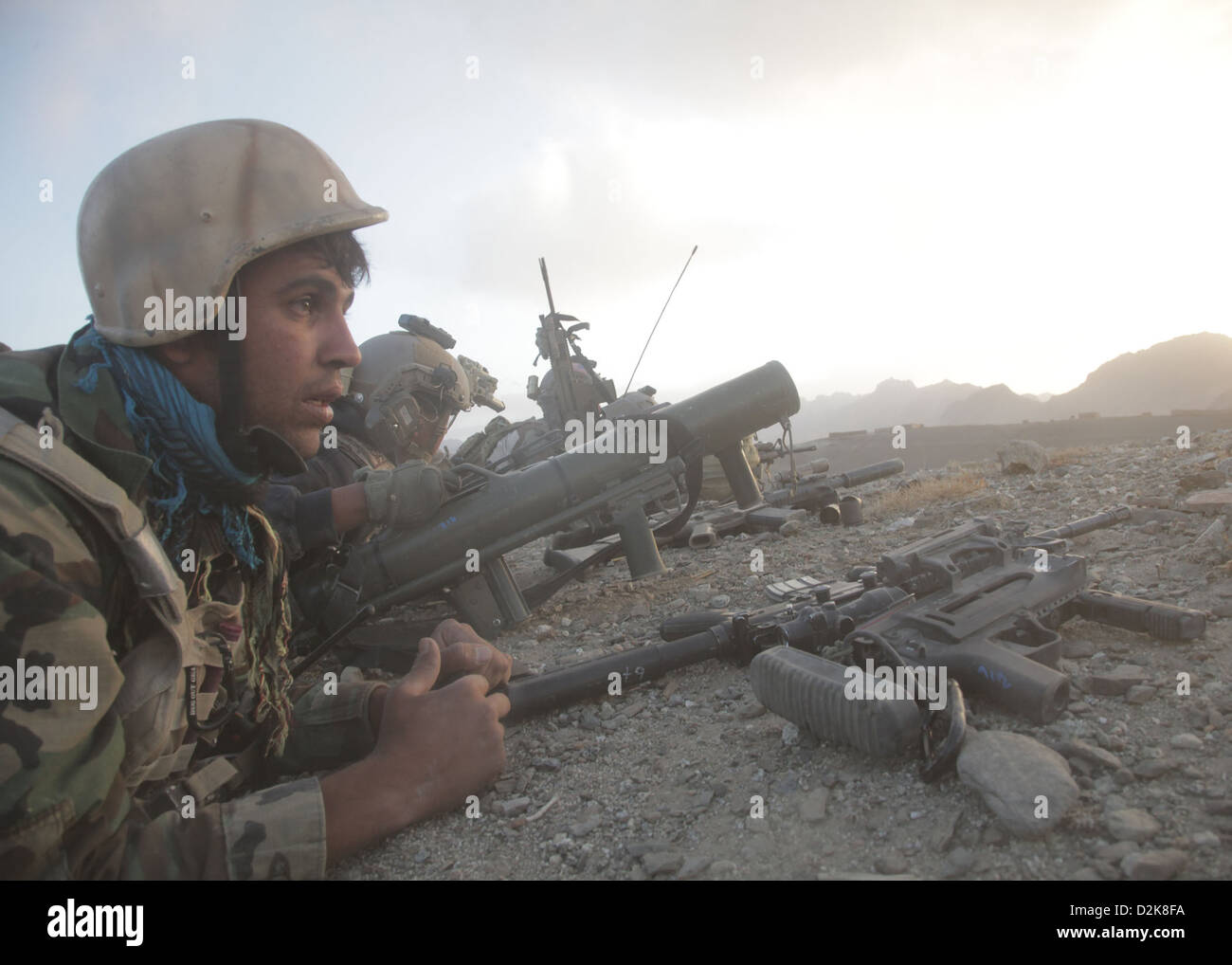 An Afghan National Army commando prepares to engage enemy insurgents ...