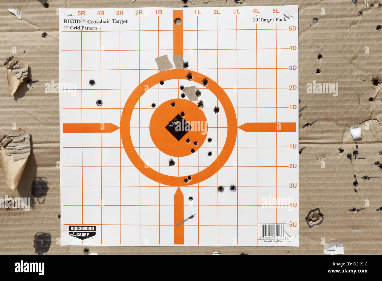 Rigid Crosshair Target with bullet holes Stock Photo - Alamy