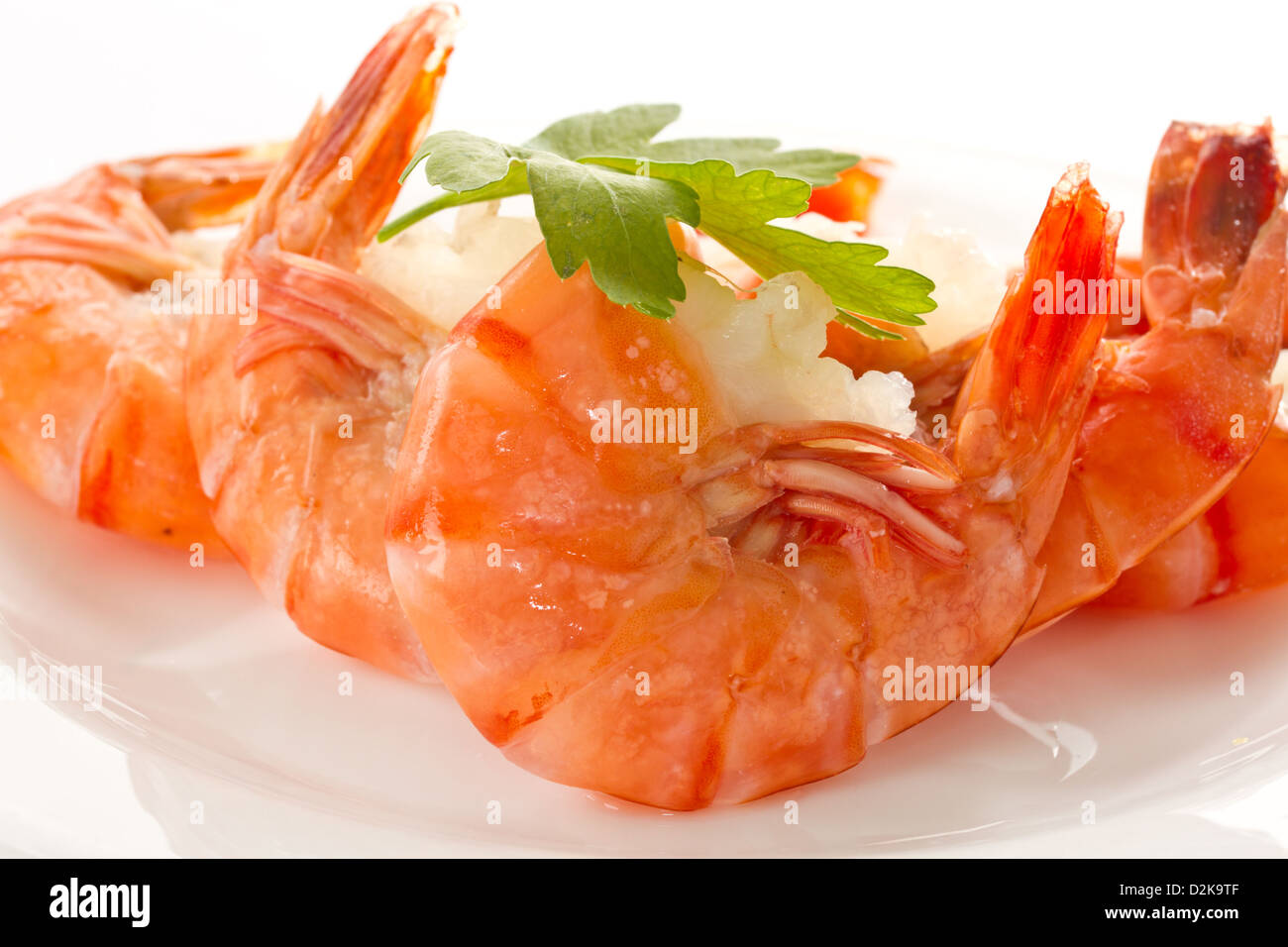 Boiled big red shrimp on a background white Stock Photo - Alamy